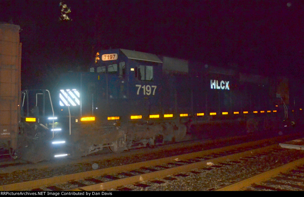 HLCX SD40-2 7197 trails on Q409-20